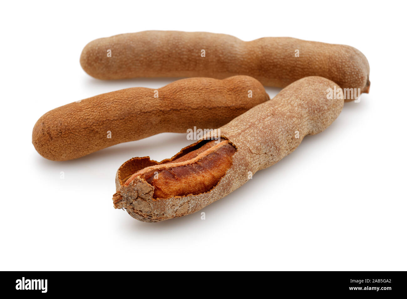 Fresh tamarind fruit isolated on white background Stock Photo - Alamy