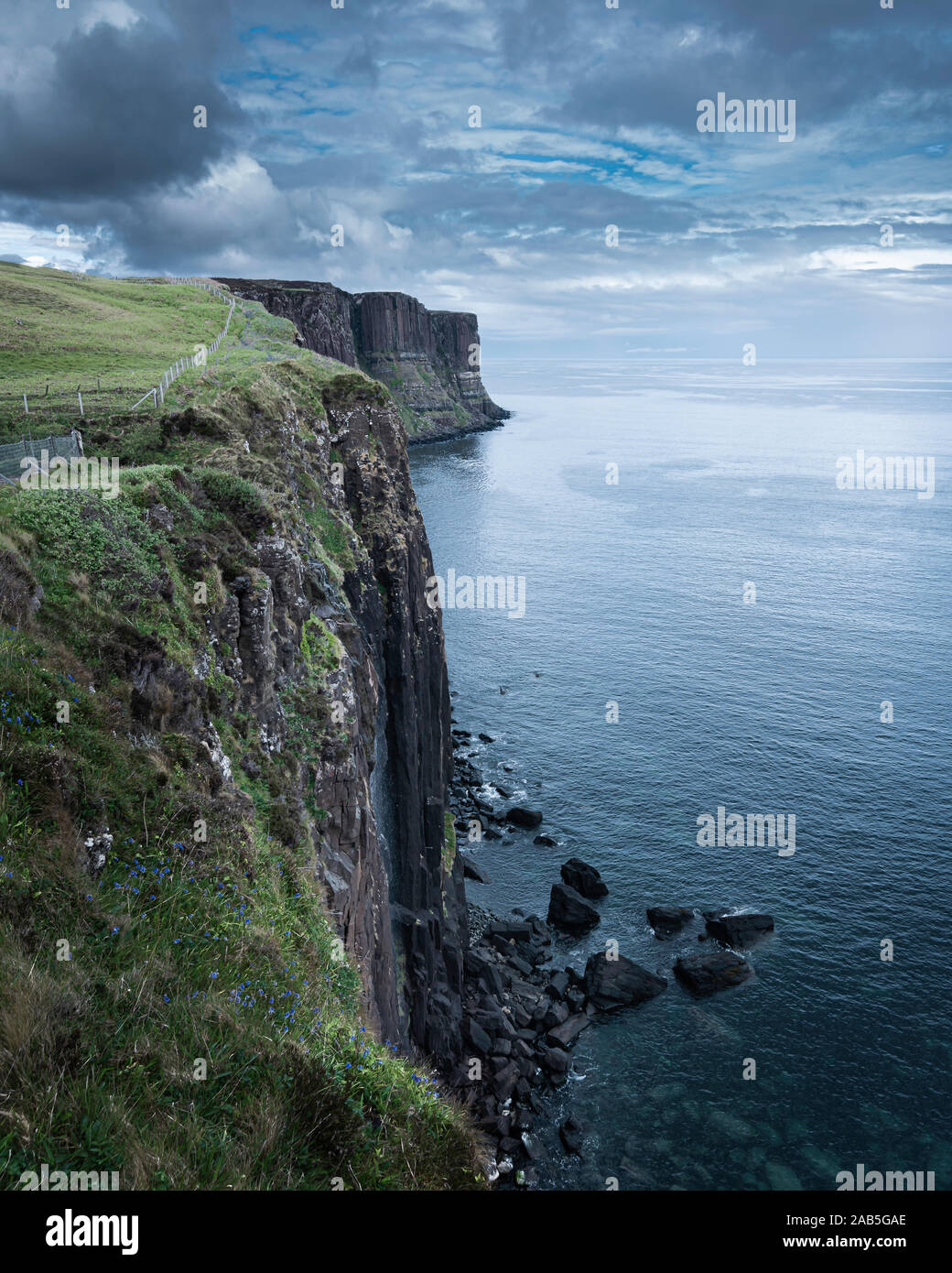Kilt rock and Mealt falls on Isle of Skye, Scotland,UK.Moody sky over ...