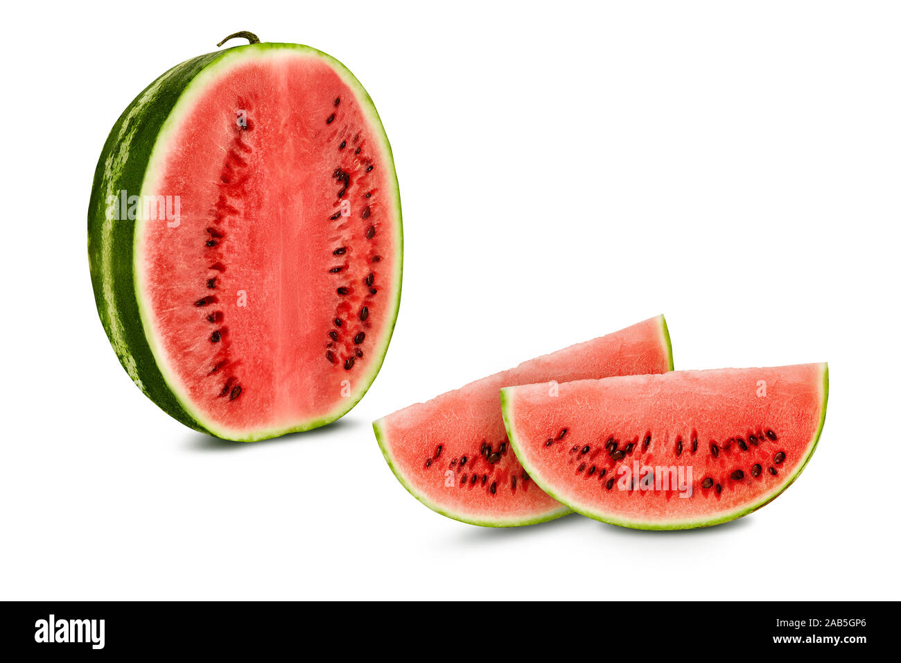 Green, striped watermelon with two slices isolated on white, copy space ...