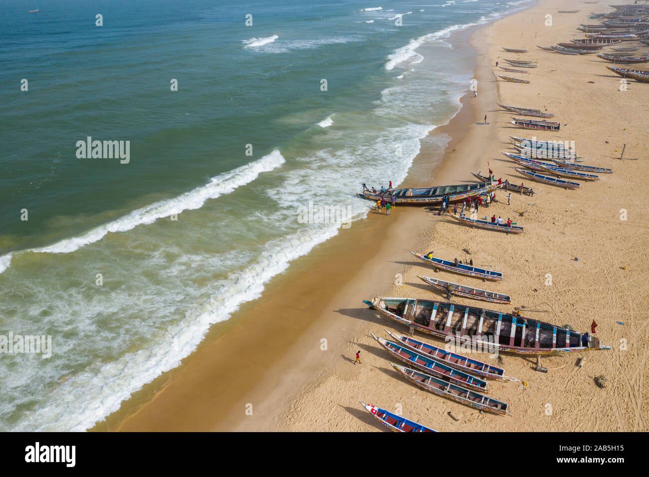 Aerial view of fishing village, pirogues fishing boats in Kayar ...
