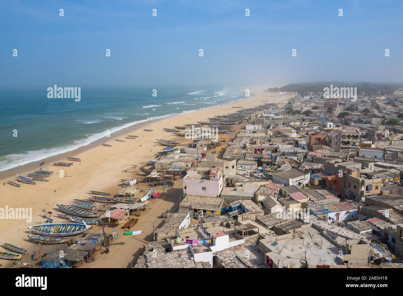 Aerial view of fishing village, pirogues fishing boats in Kayar ...