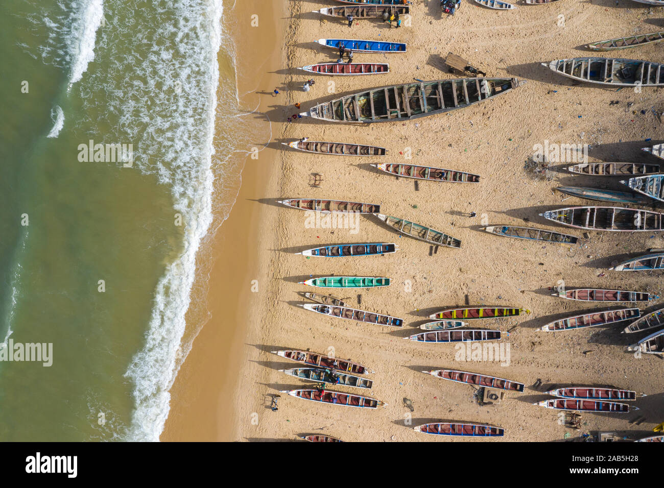 Aerial view of fishing village, pirogues fishing boats in Kayar ...