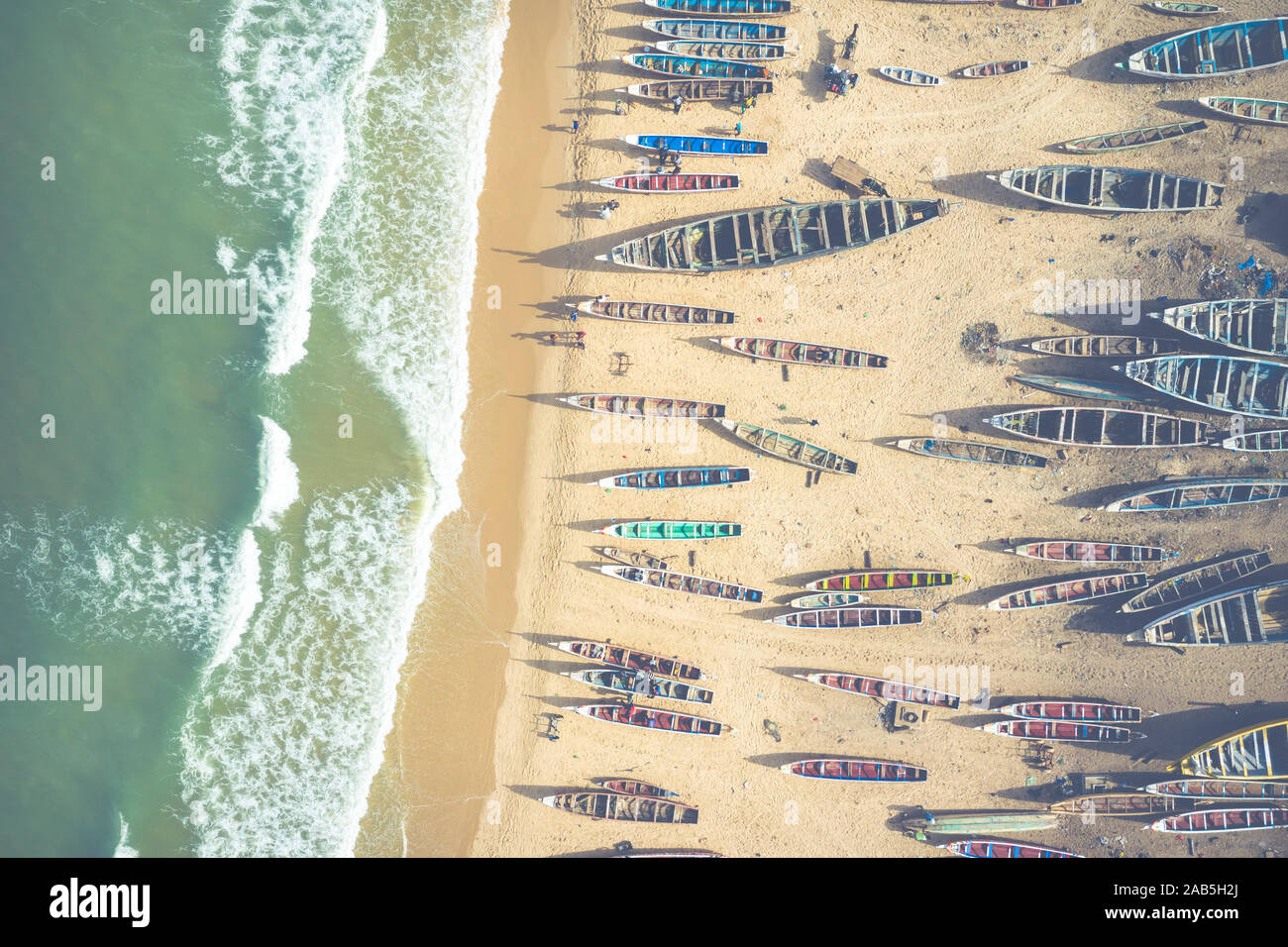 Aerial view of fishing village, pirogues fishing boats in Kayar ...