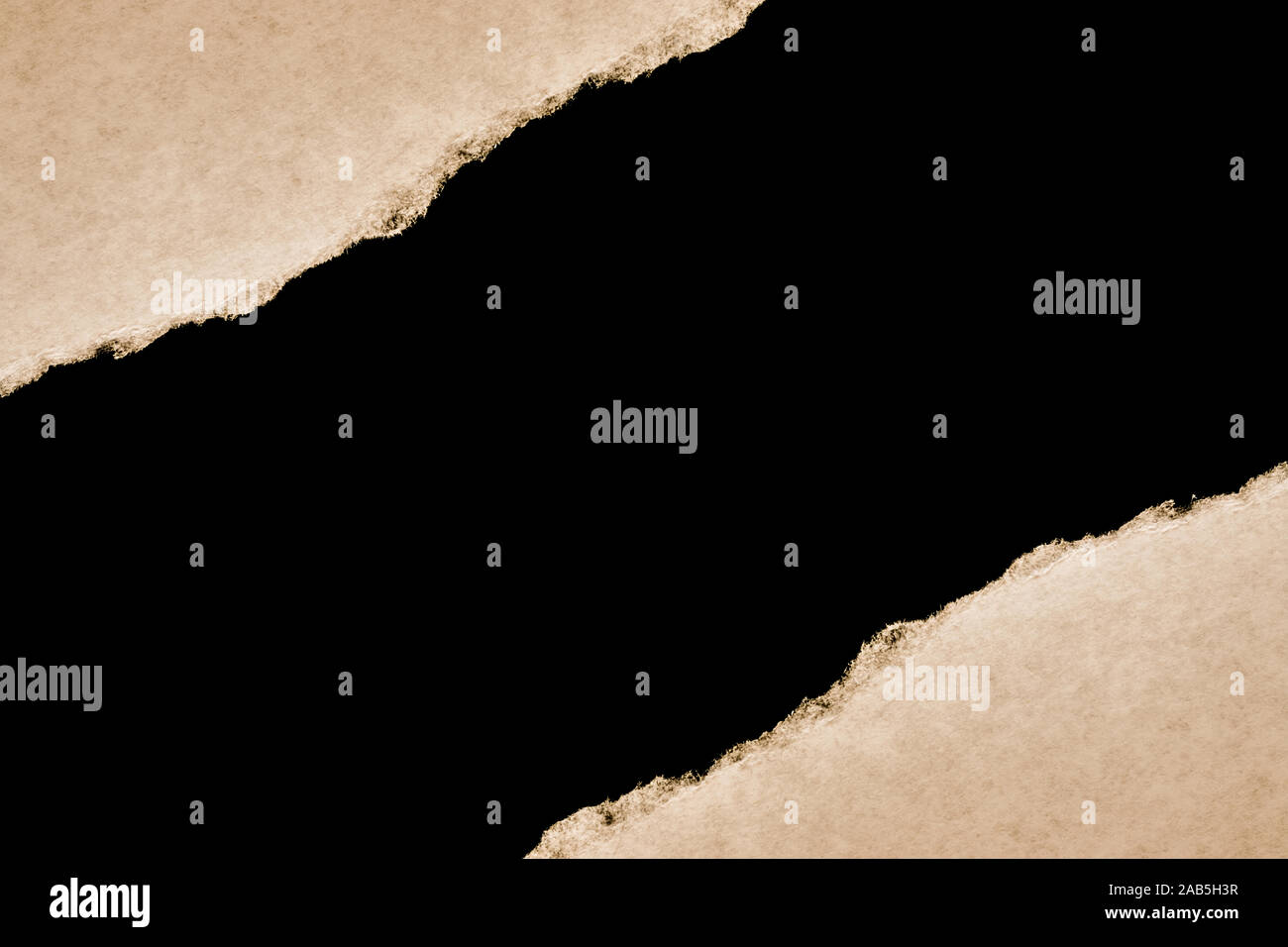 Old vintage paper with torn edges and a black isolated background ...