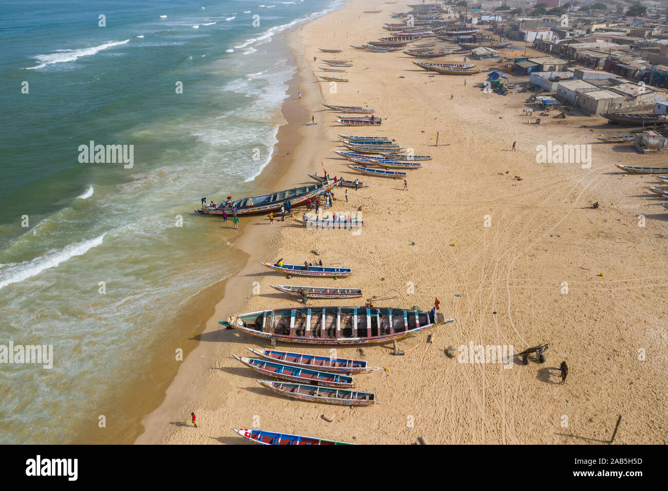 Aerial view of fishing village, pirogues fishing boats in Kayar ...
