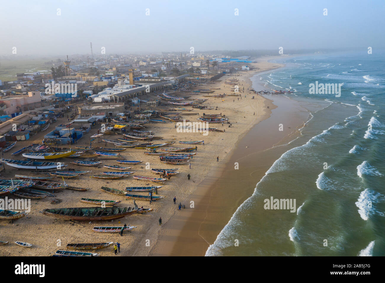 Aerial view of fishing village, pirogues fishing boats in Kayar ...