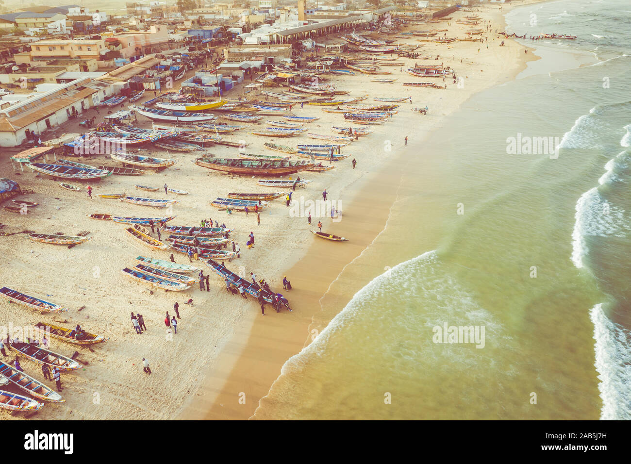 Aerial view of fishing village, pirogues fishing boats in Kayar ...