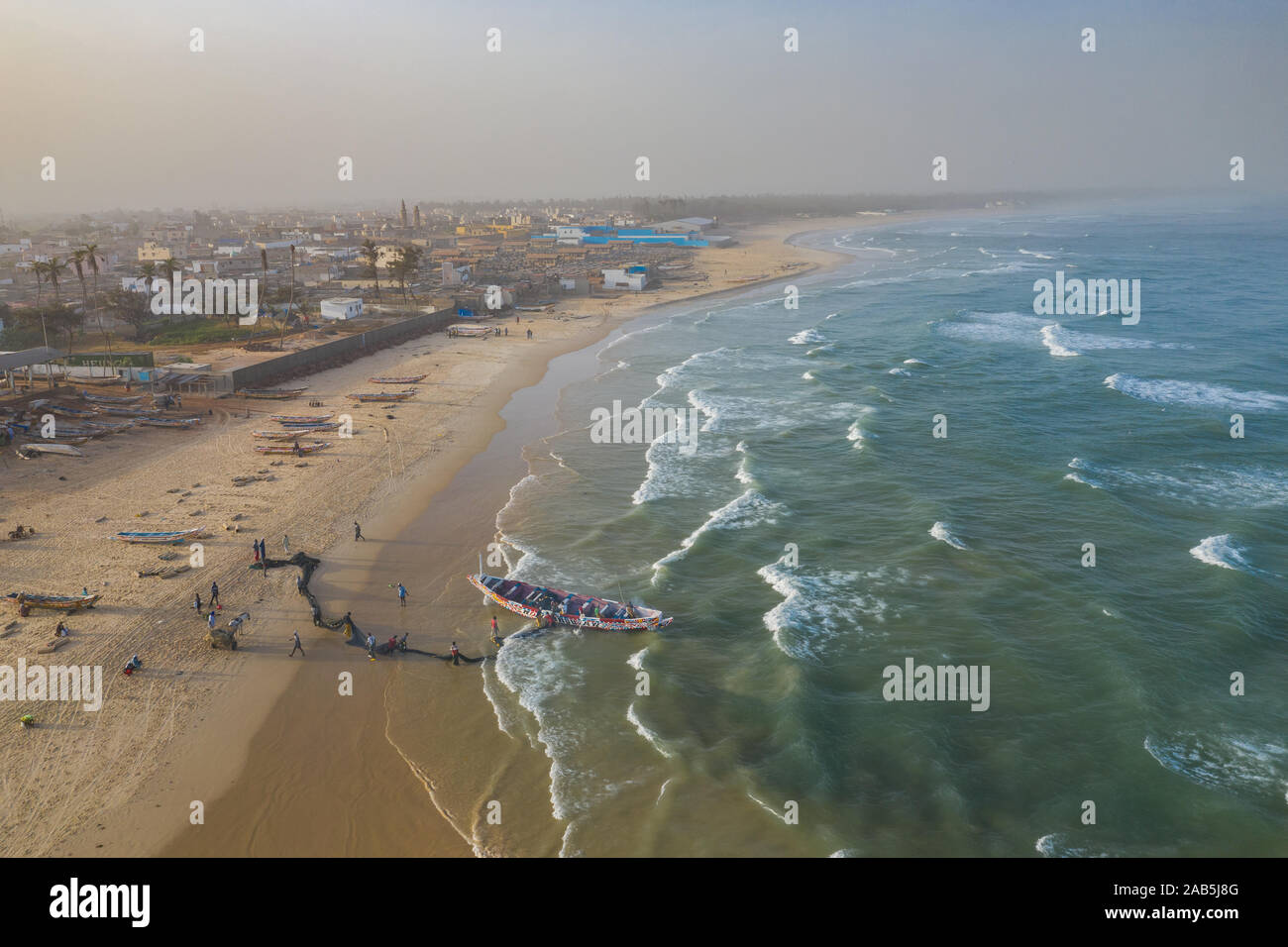 Aerial view of fishing village, pirogues fishing boats in Kayar ...