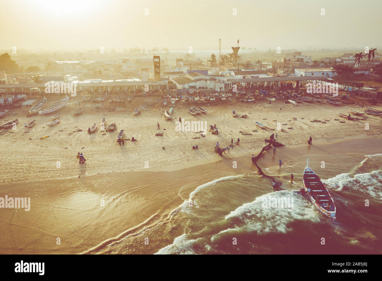 Aerial view of fishing village, pirogues fishing boats in Kayar ...