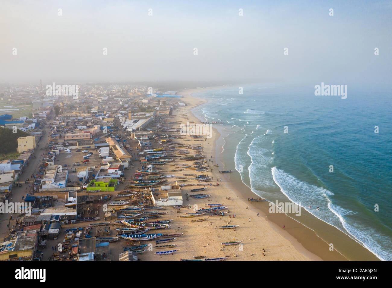 Aerial view of fishing village, pirogues fishing boats in Kayar ...