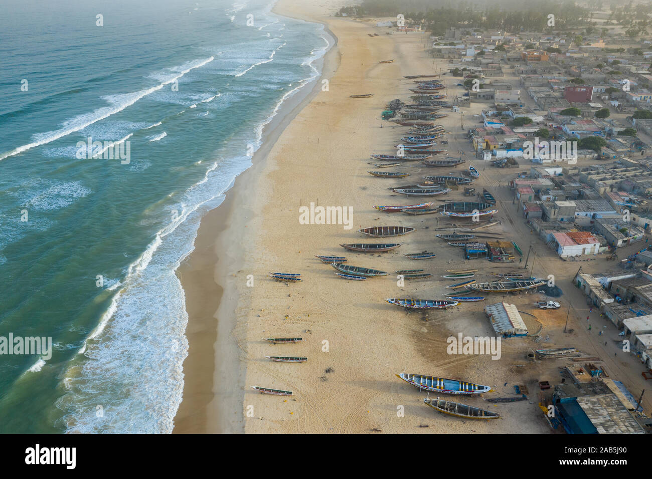 Aerial view of fishing village, pirogues fishing boats in Kayar ...