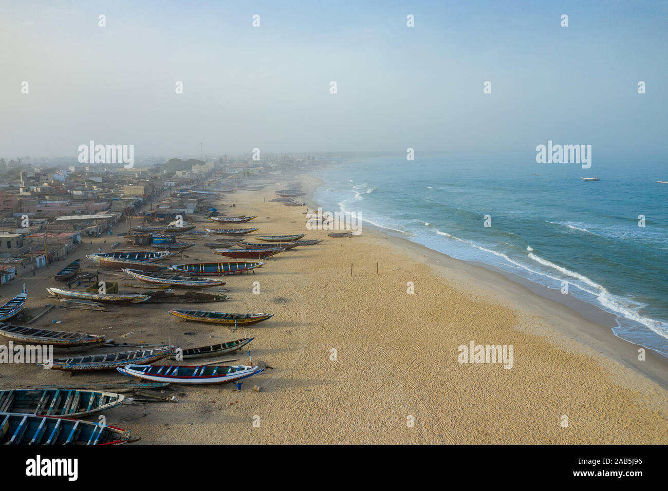 Aerial view of fishing village, pirogues fishing boats in Kayar ...