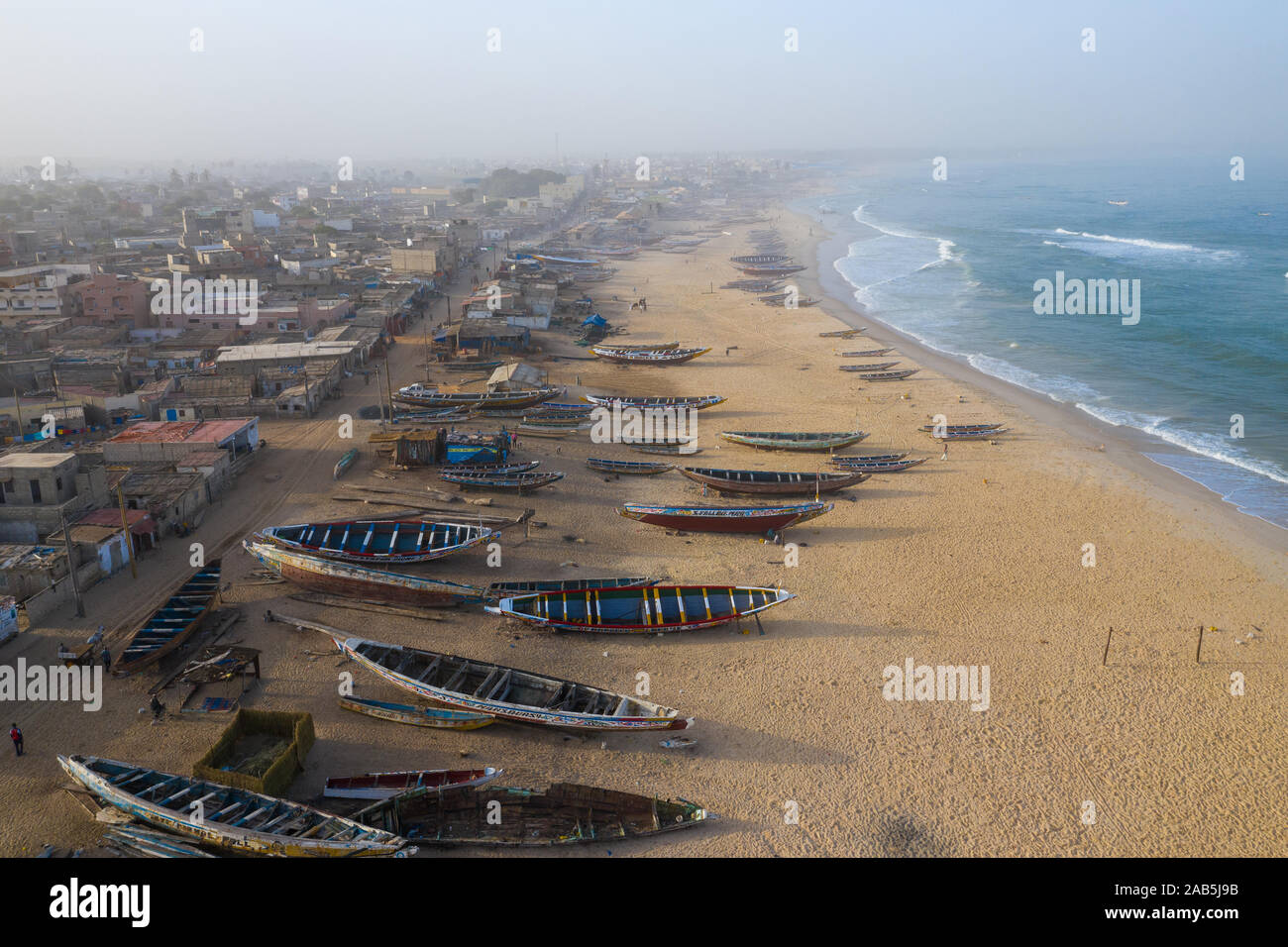 Aerial view of fishing village, pirogues fishing boats in Kayar ...