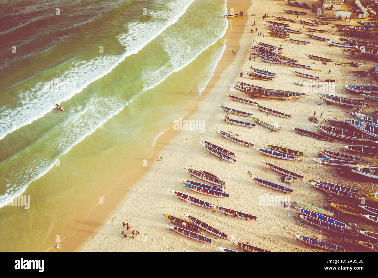 Aerial view of fishing village, pirogues fishing boats in Kayar ...