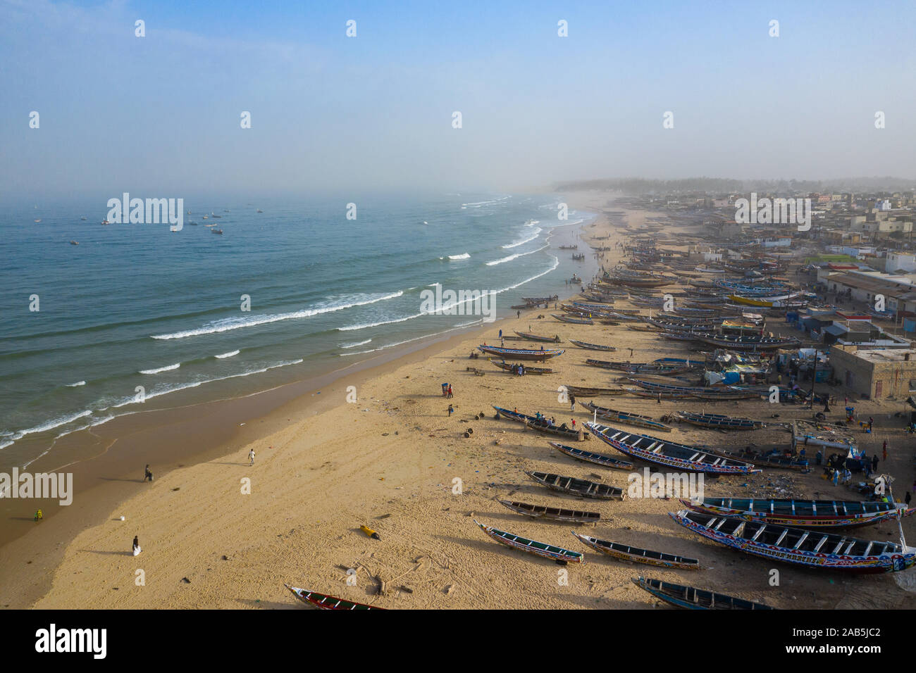 Aerial view of fishing village, pirogues fishing boats in Kayar ...