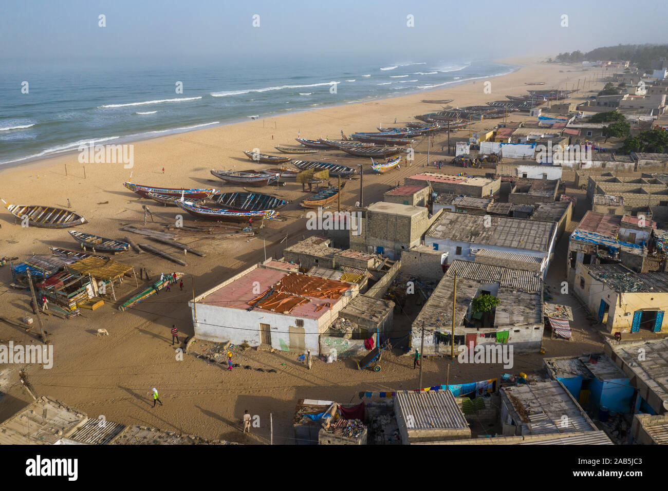 Aerial view of fishing village, pirogues fishing boats in Kayar ...