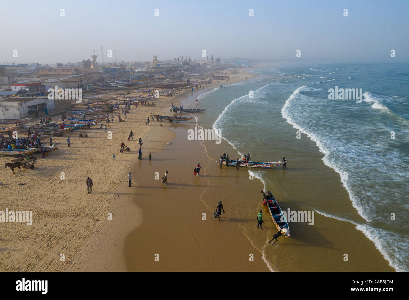Aerial view of fishing village, pirogues fishing boats in Kayar ...