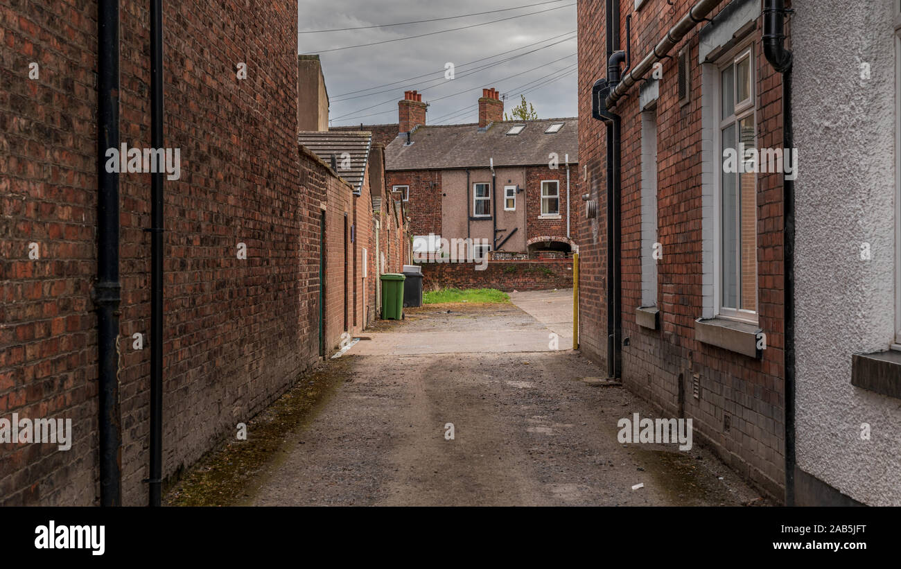 Small road into a backyard with some houses in Carlisle, Cumbria ...