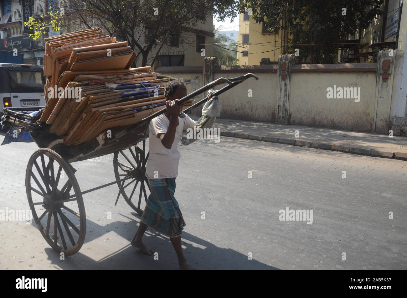 A rickshaw puller in kolkata hi-res stock photography and images - Alamy