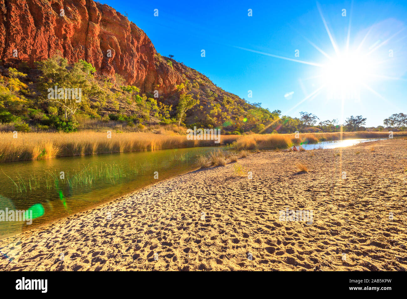 Glen Helen Gorge with sunrays and waterhole in Central Australian ...