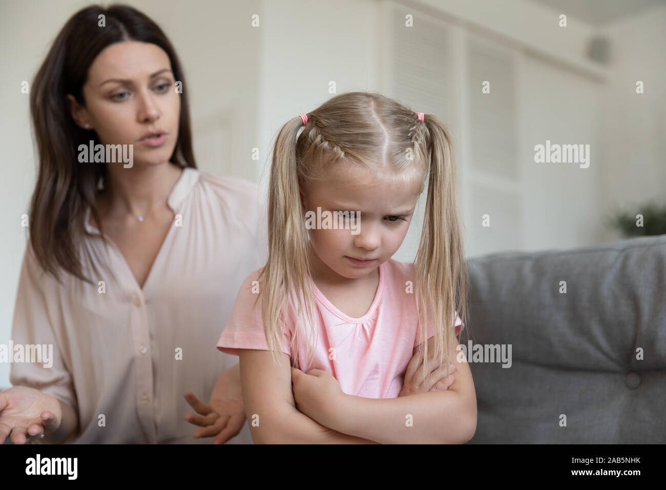Angry mom scolding stubborn fussy upset little kid daughter Stock Photo ...