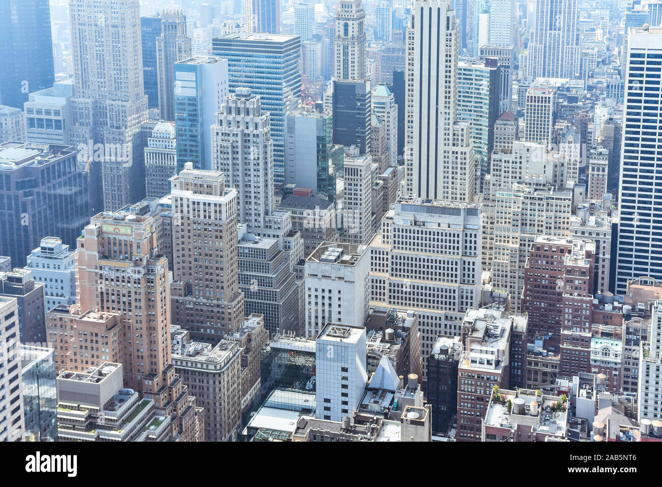 Aerial close up view of crowded buildings in New York City on a sunny ...