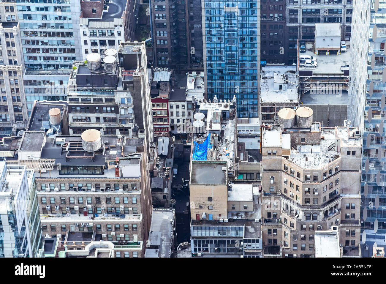 Aerial close up view of crowded buildings in New York City on a sunny ...