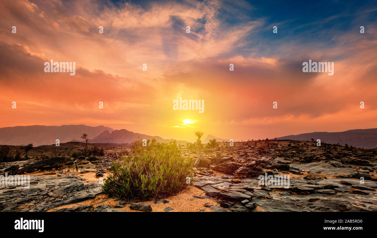 Beautiful view of sunset from a plateau on Jebel Shams Mountain in Oman ...