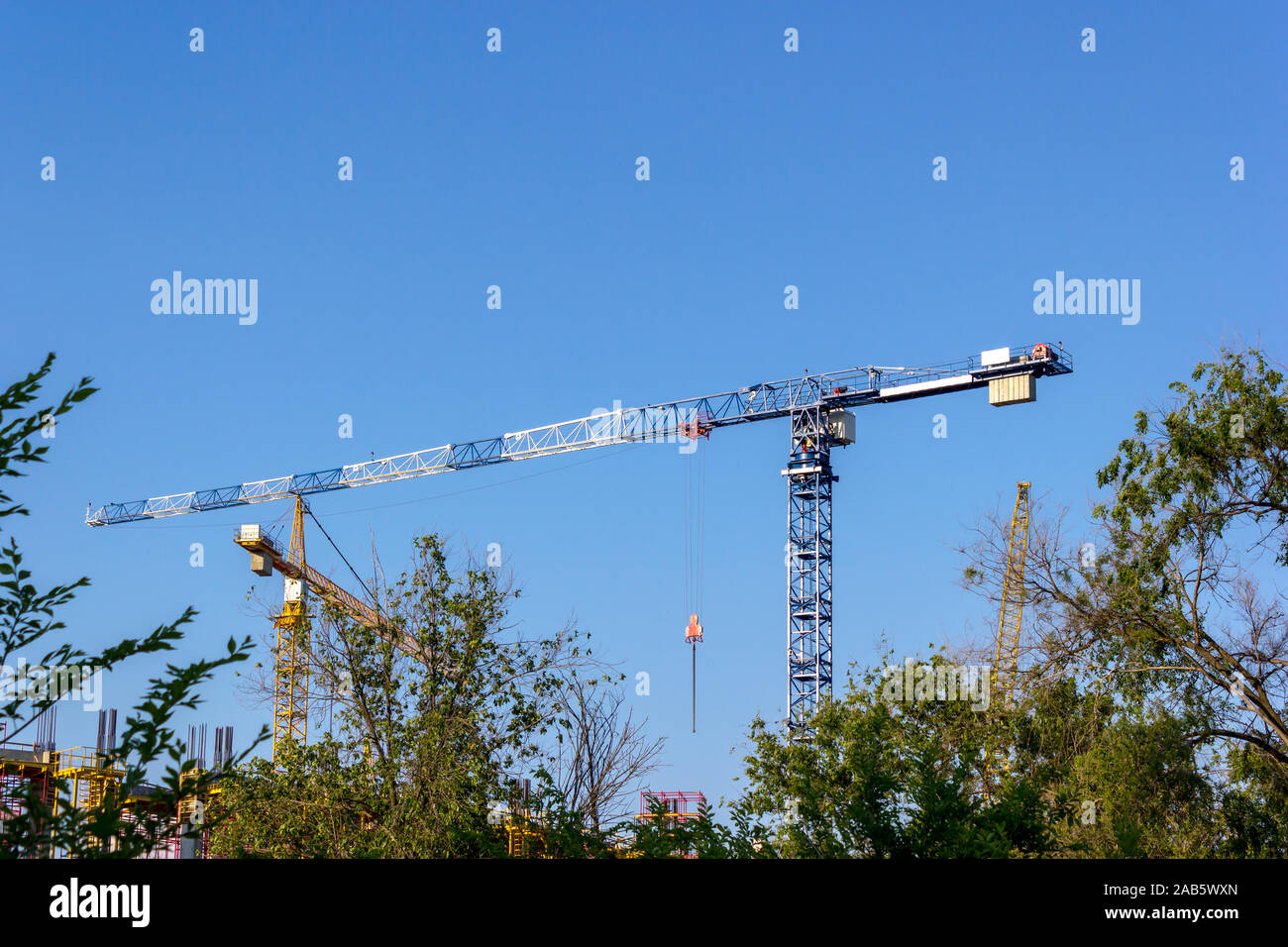 Construction site with crane and building Stock Photo - Alamy