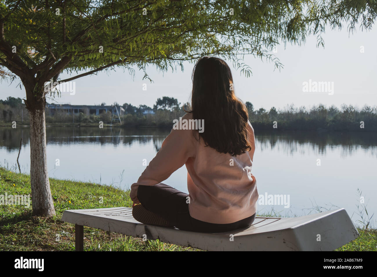 Beautiful girl relaxing at the "Gold Lake" in Poti, Georgia. People ...