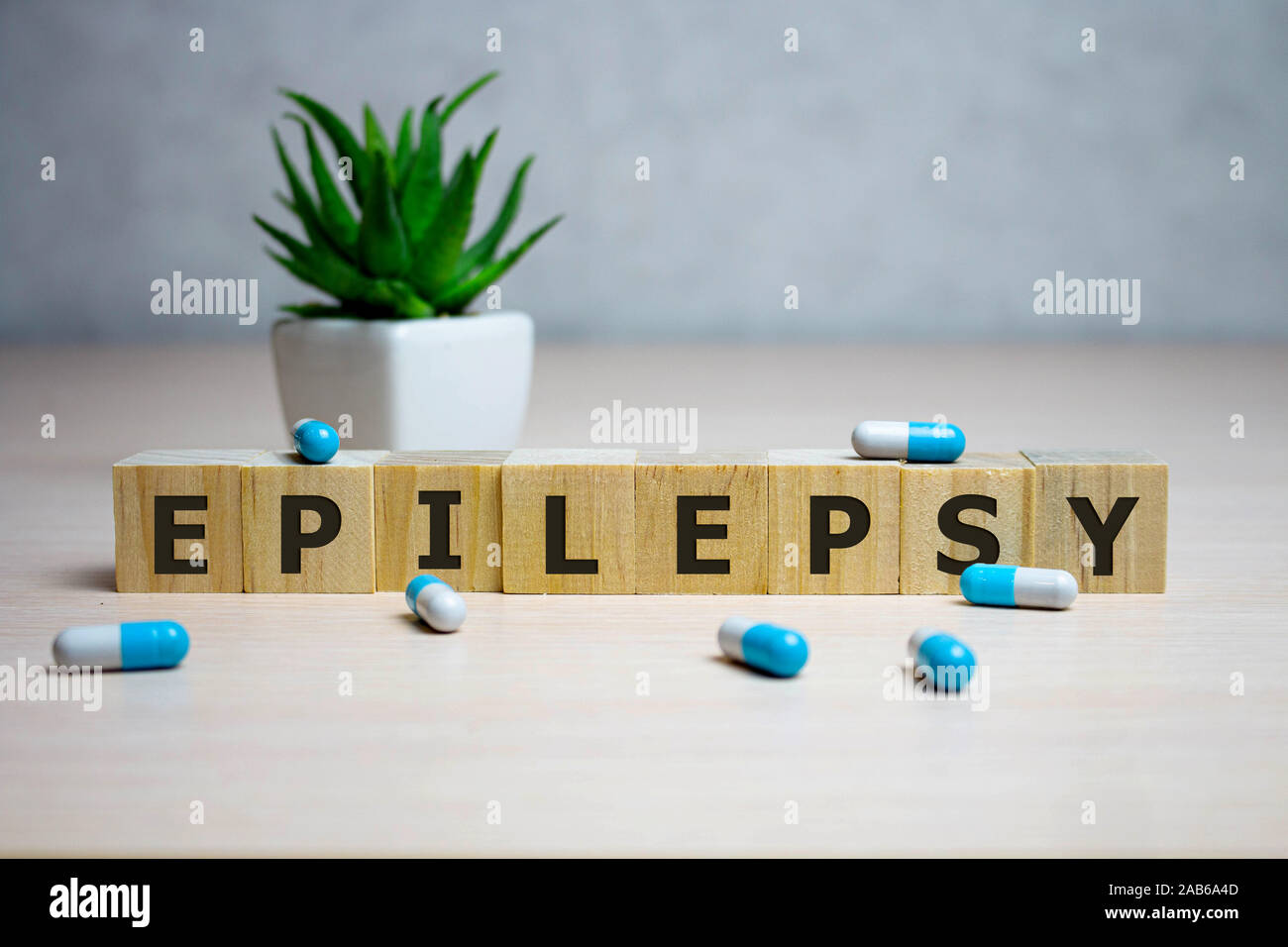 EPILEPSY word on wooden cubes, background. Concept of epilepsy ...