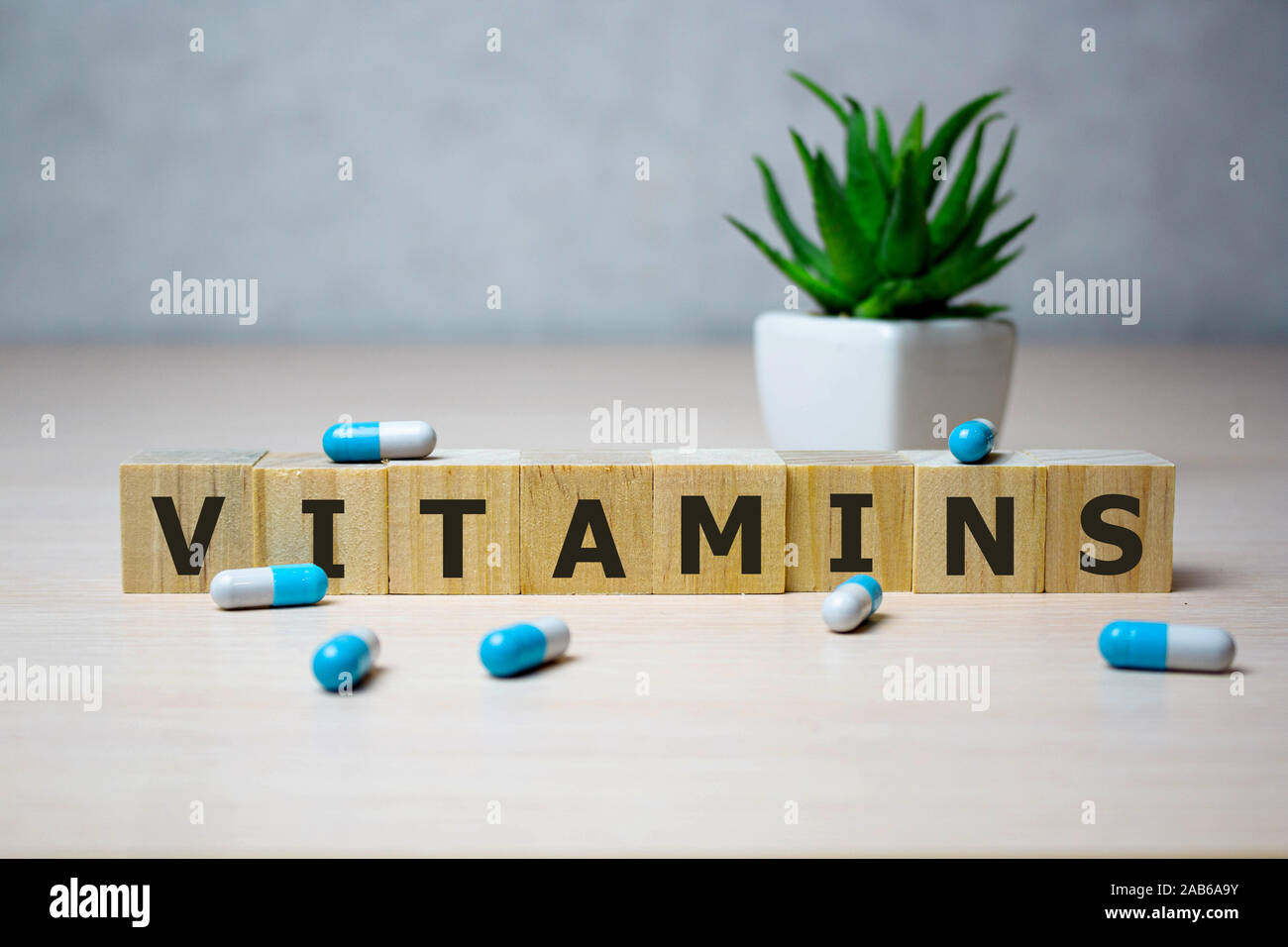 Close up vitamin word made from wooden cubes, background, Health ...