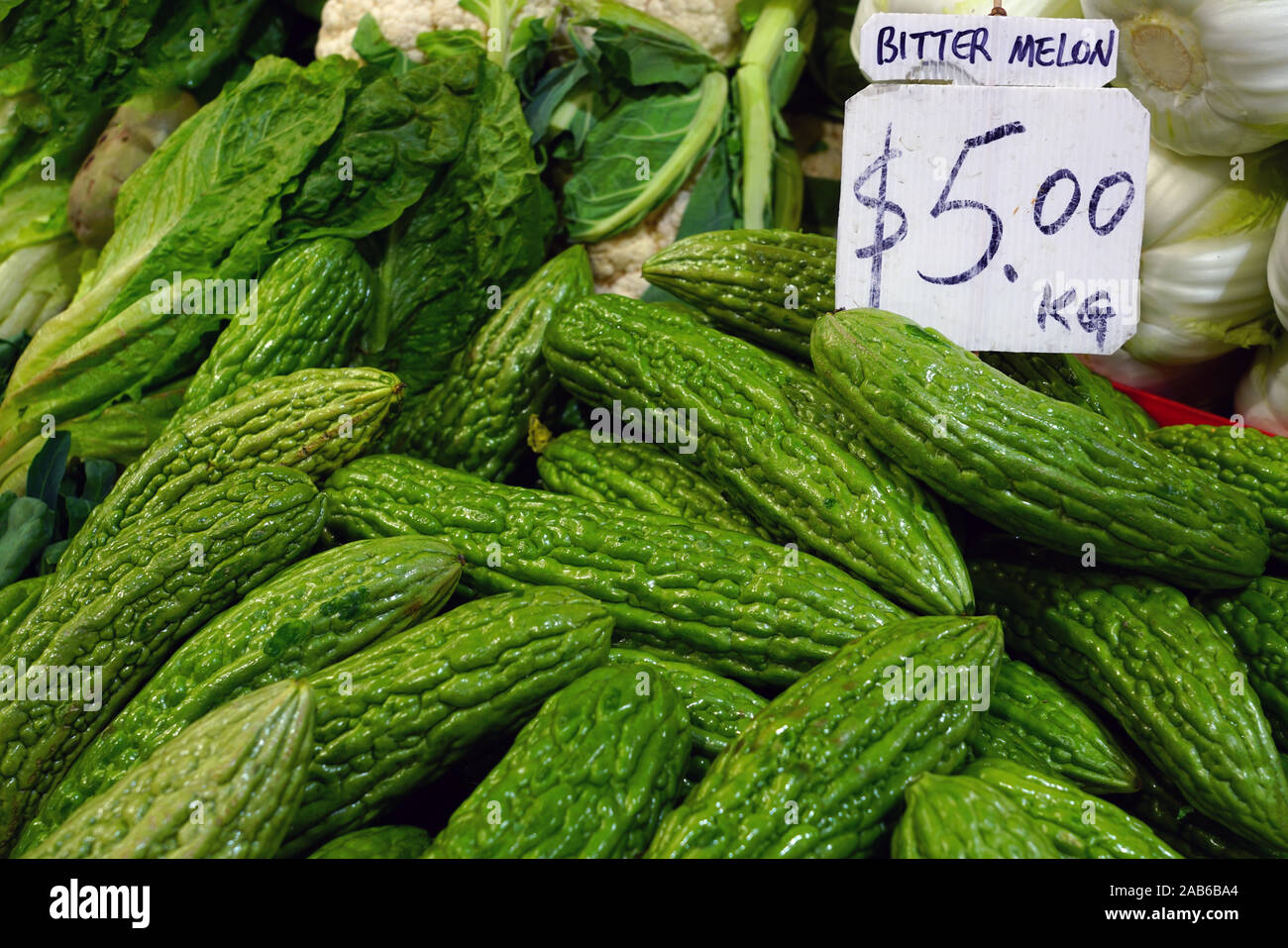 Goya bitter melon (momordica charantia) for sale at a market in ...