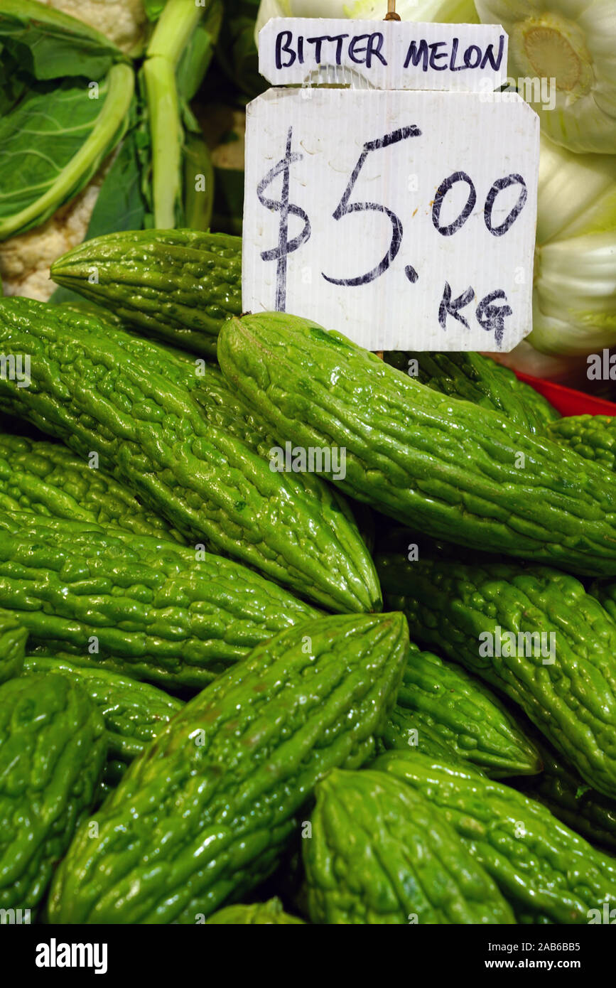 Goya bitter melon (momordica charantia) for sale at a market in ...