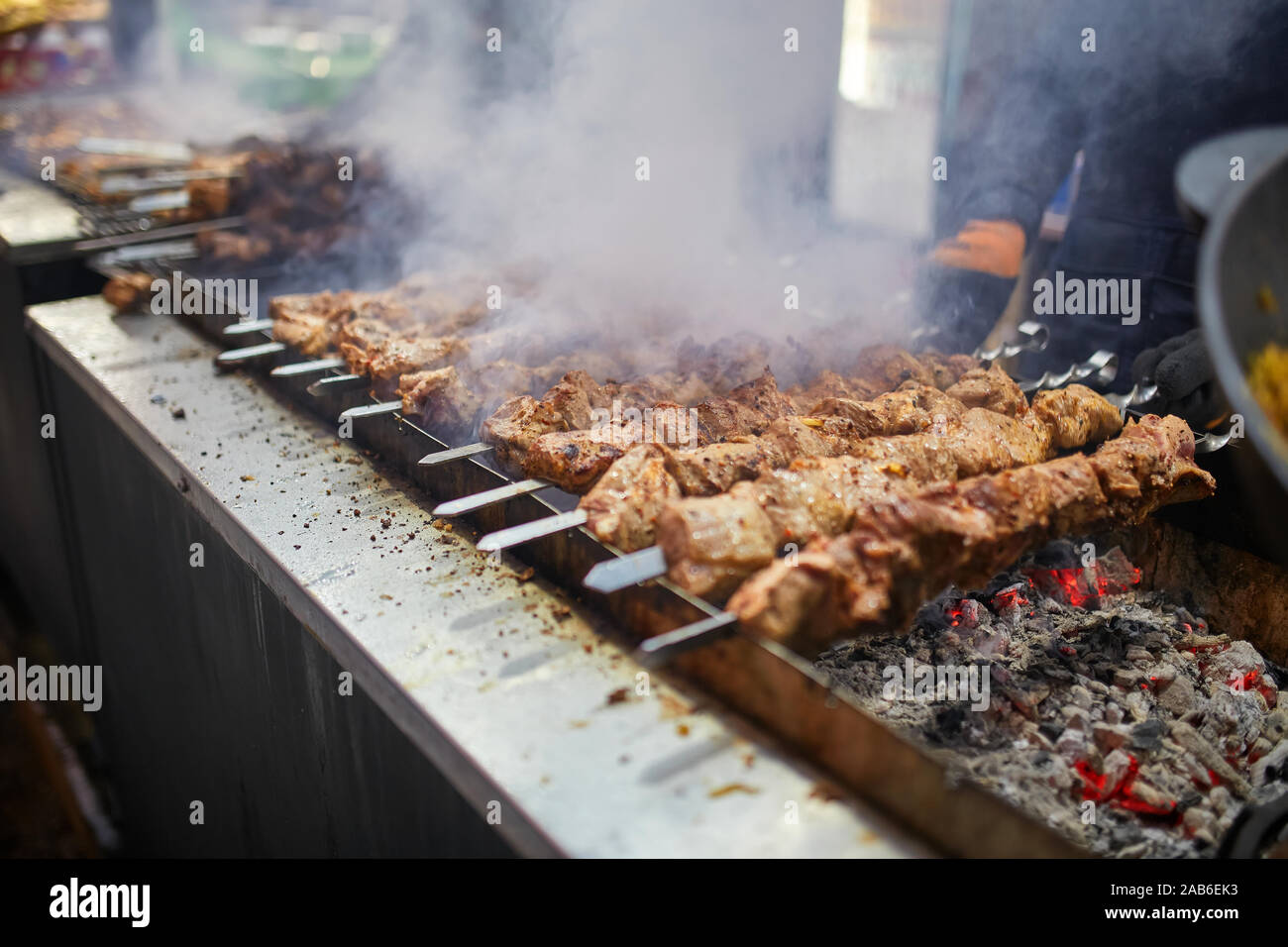 Grilled meat, barbecue. Christmas Fair. Street food. Christmas Market ...