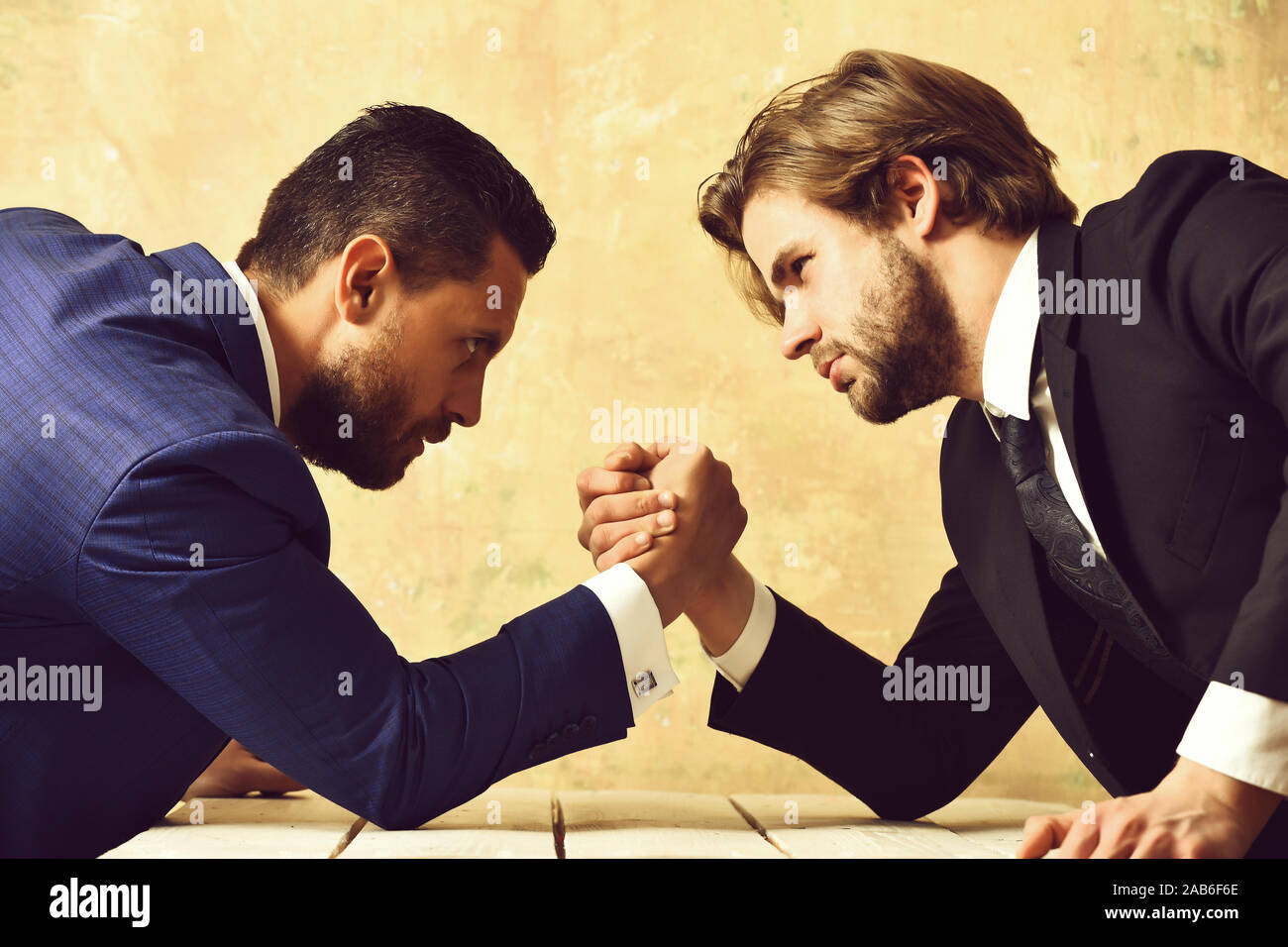 partnership and teamwork, arm wrestling of businessman and compete man ...
