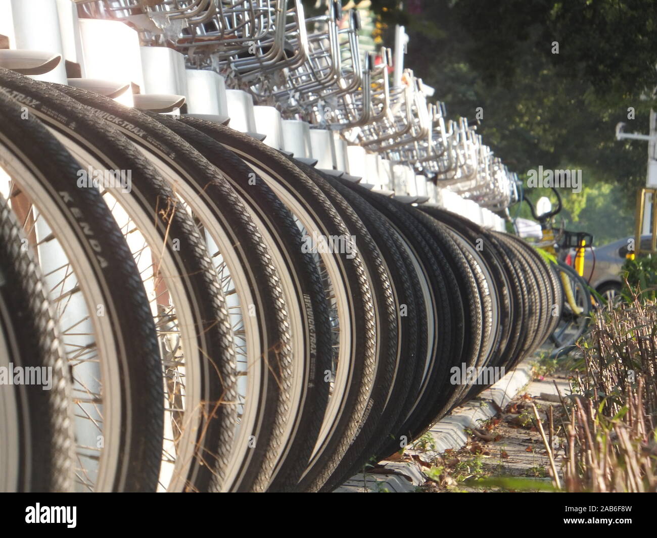 Bicycles line up in the street Stock Photo - Alamy