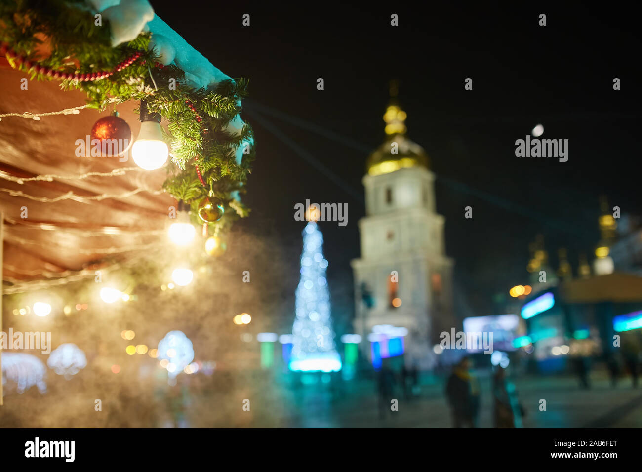 New Year and Christmas festoon illumination on city alley Stock Photo ...