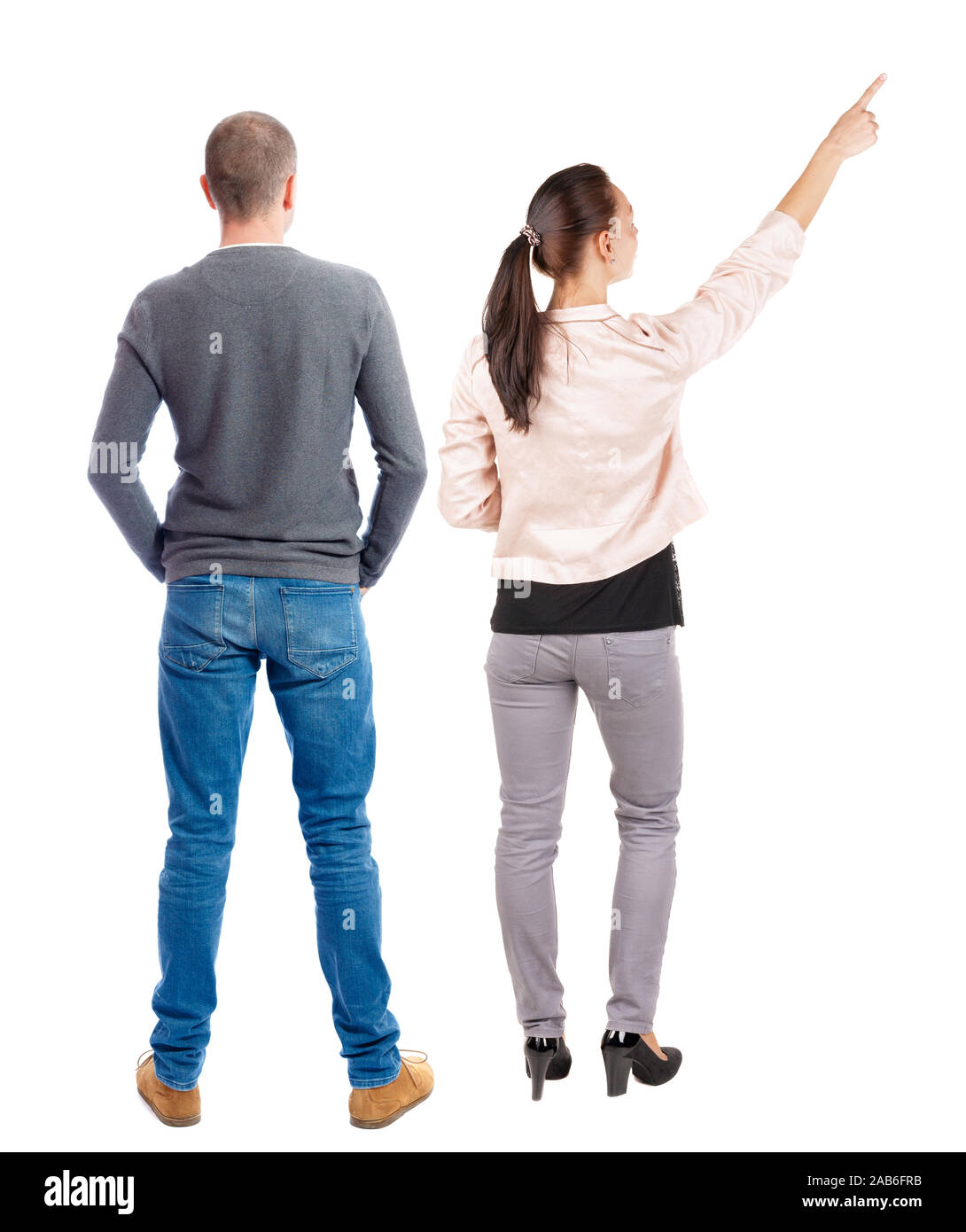 Back view of couple. beautiful friendly girl and guy together. Rear ...