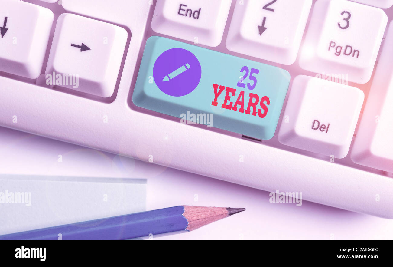 Writing note showing 25 Years. Business concept for Remembering or ...