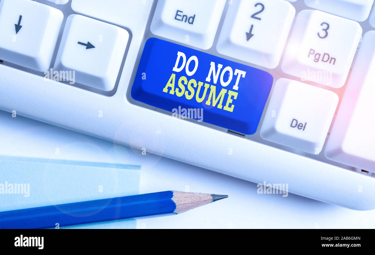 Writing note showing Do Not Assume. Business concept for Ask first to ...