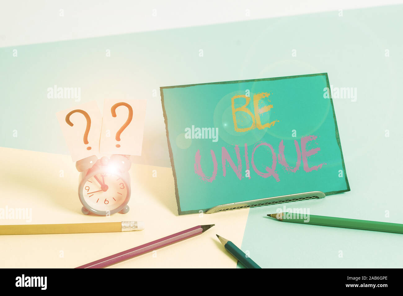 Writing note showing Be Unique. Business concept for being the only one ...