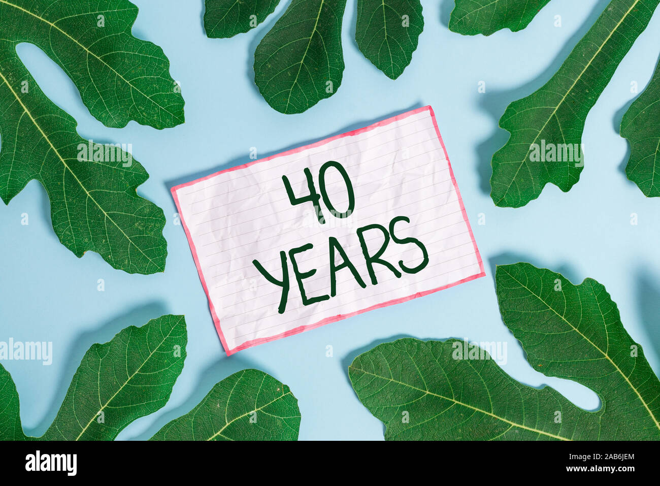 Handwriting text writing 40 Years. Conceptual photo Remembering or ...