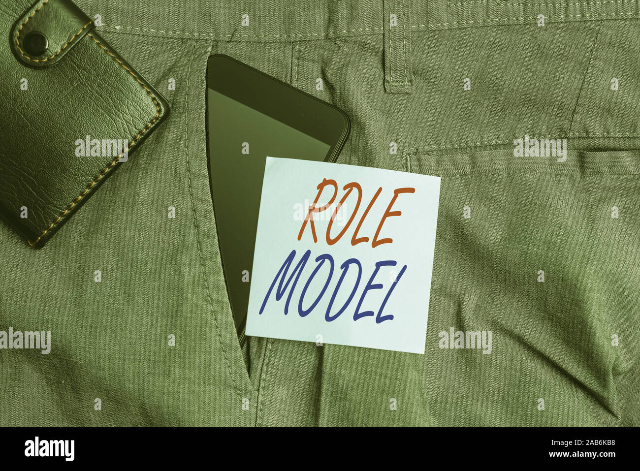 Conceptual hand writing showing Role Model. Concept meaning a ...