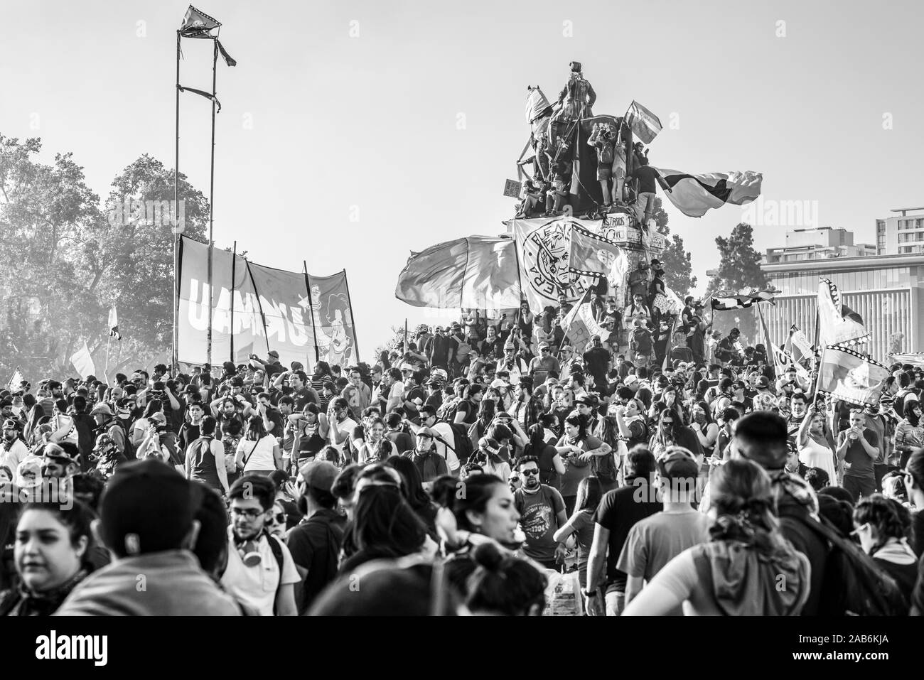People crowds protesting at Santiago de Chile Baquedano Statue in Plaza ...