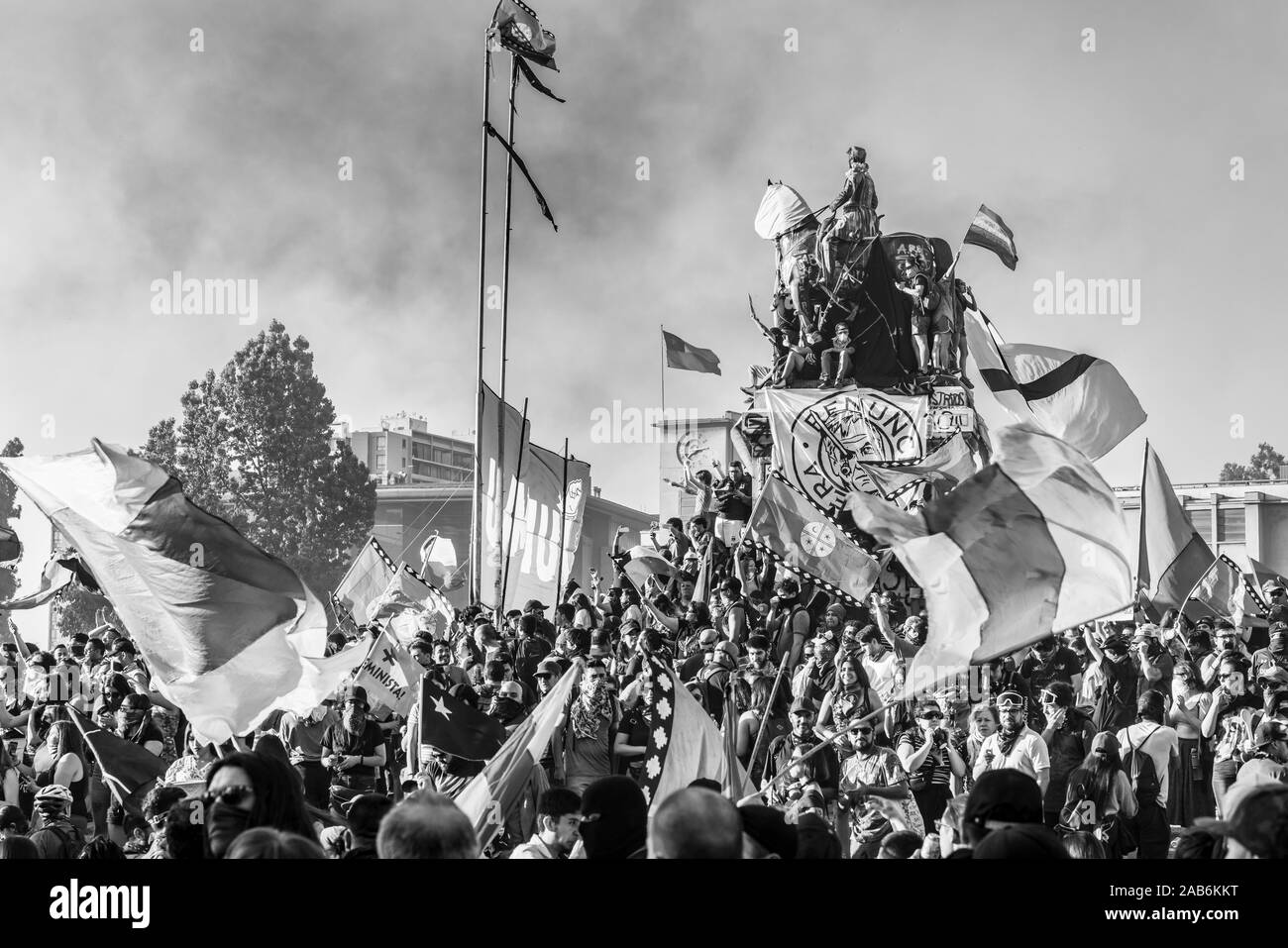 People crowds protesting at Santiago de Chile Baquedano Statue in Plaza ...