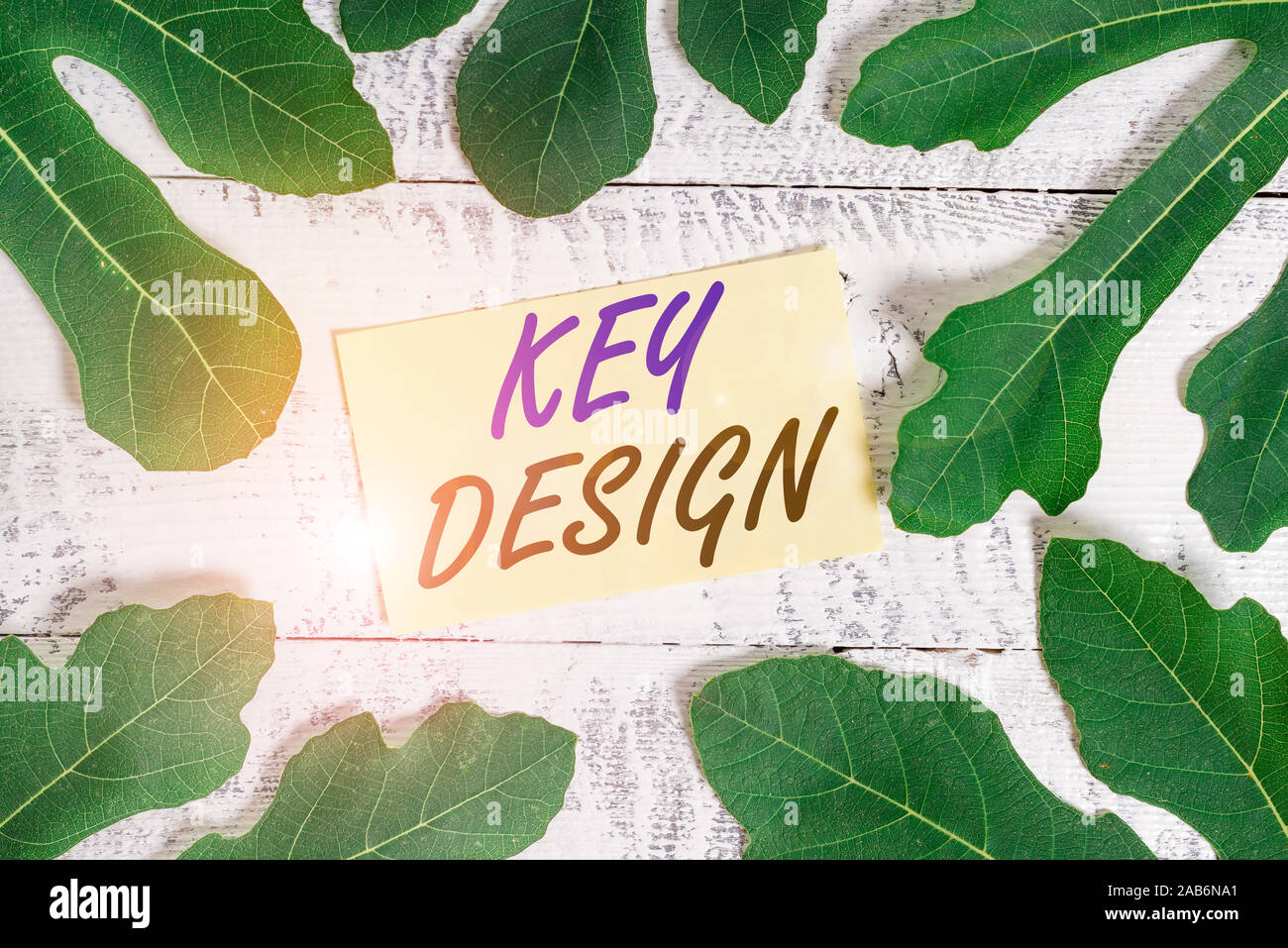 Writing note showing Key Design. Business concept for a necessary or ...