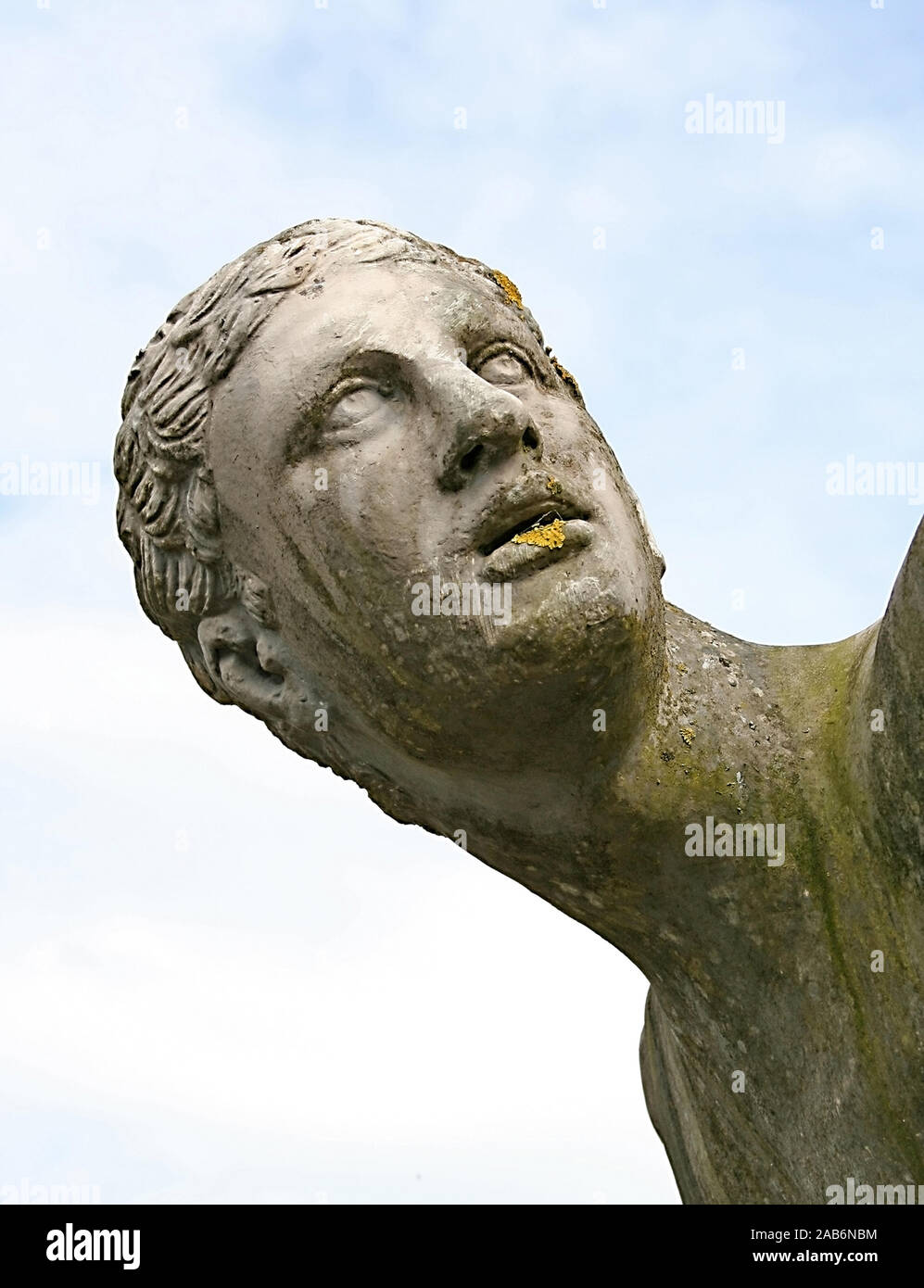 A photography of an old stone head Stock Photo - Alamy