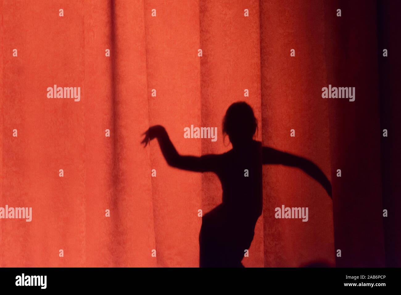 Shadow dancing on the curtain. Reflection dance on colored fabric Stock ...