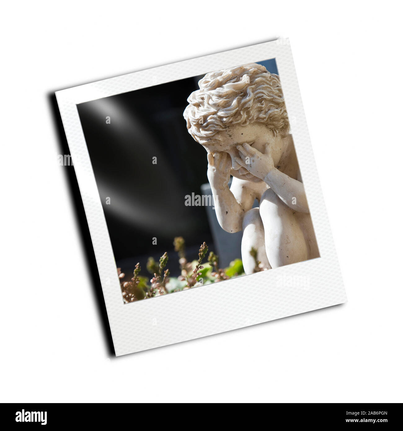 A photography of a sad little angel in a photo frame Stock Photo - Alamy